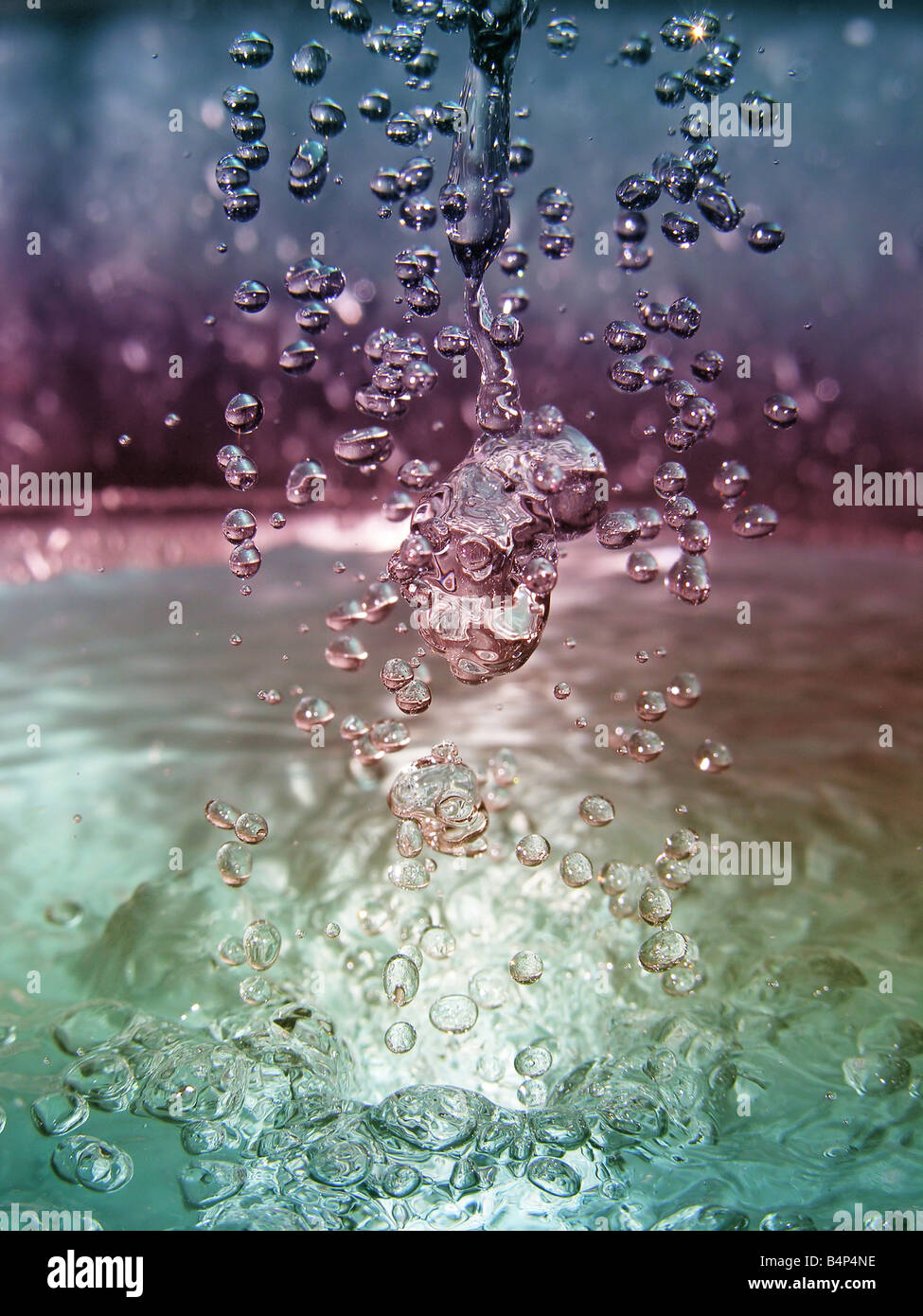 Rainbow coloured water drops Stock Photo - Alamy