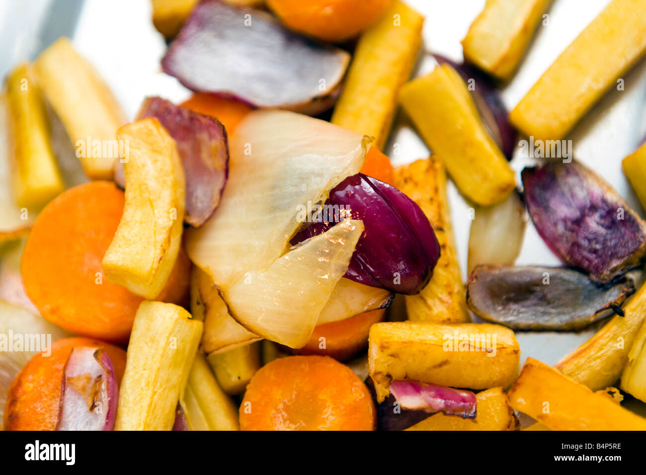 Mixed vegetables roasted in the oven Stock Photo - Alamy