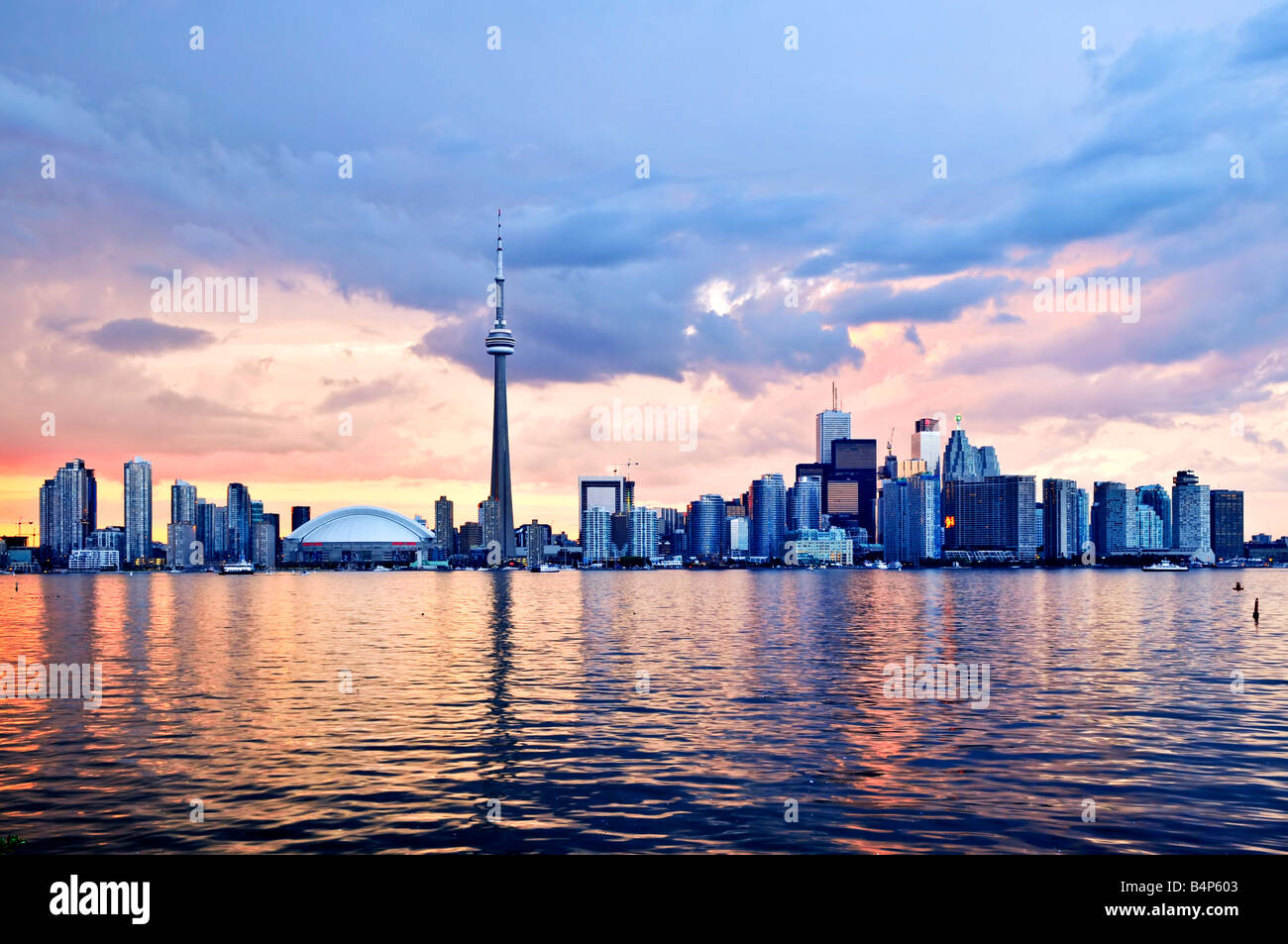 Scenic view at Toronto city waterfront skyline at sunset Stock Photo ...