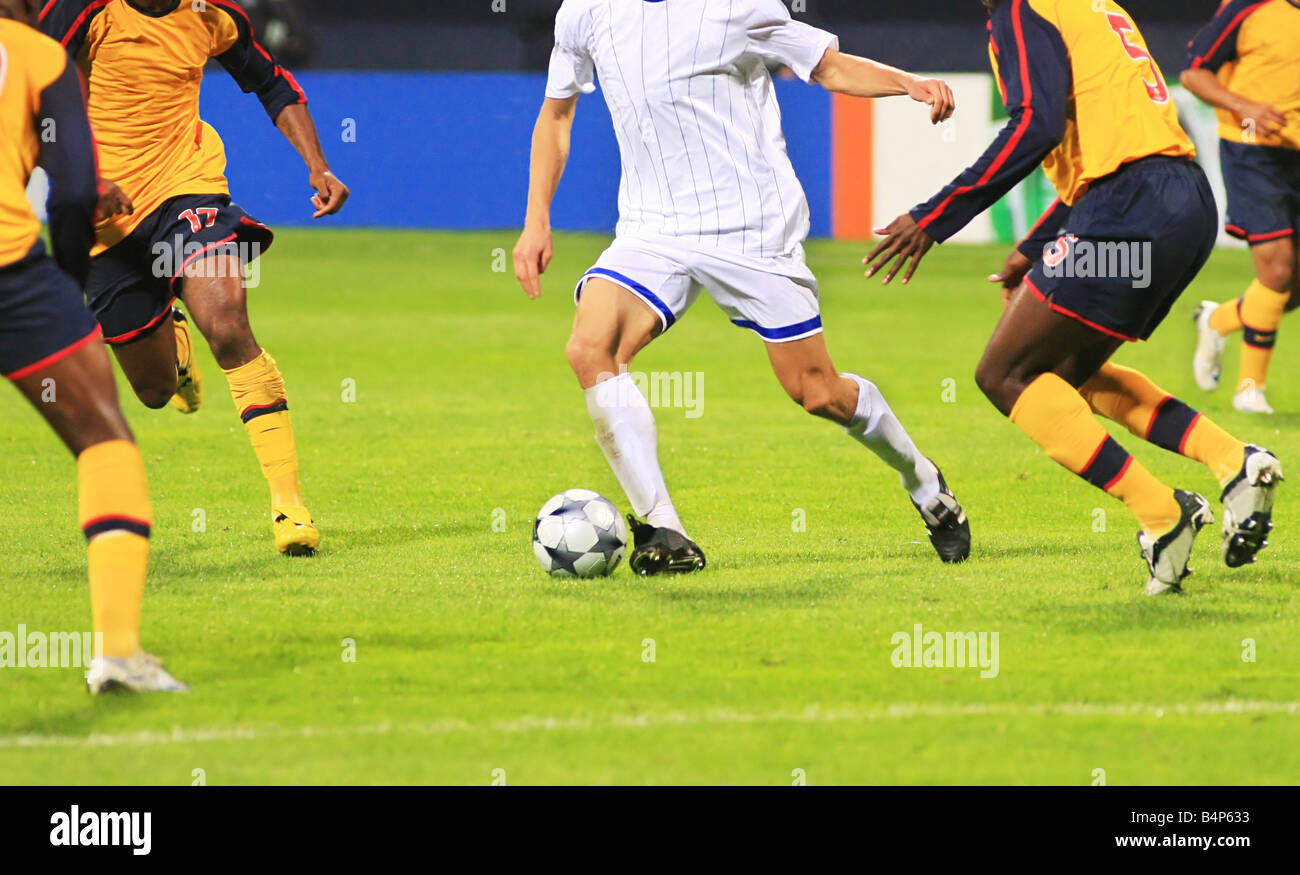 Detail of a soccer game with many players in action Stock Photo - Alamy