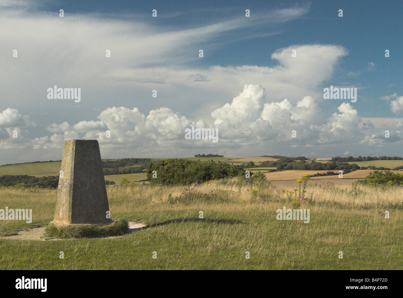 Trig point (triangulation pillar) on the ancient Iron Age Hill Fort of ...