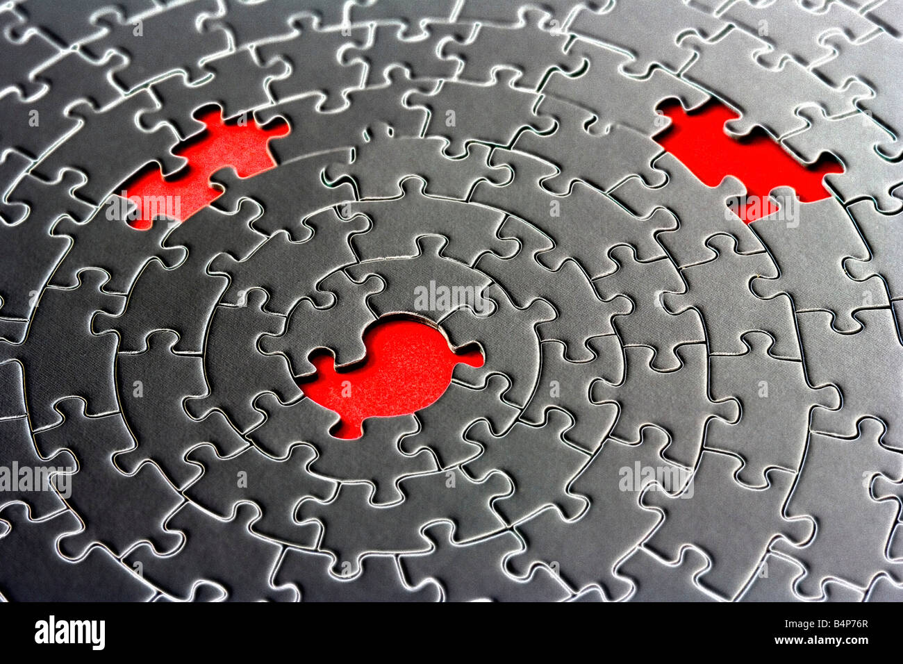abstract of three missing pieces in a jigsaw focus is on the center ...