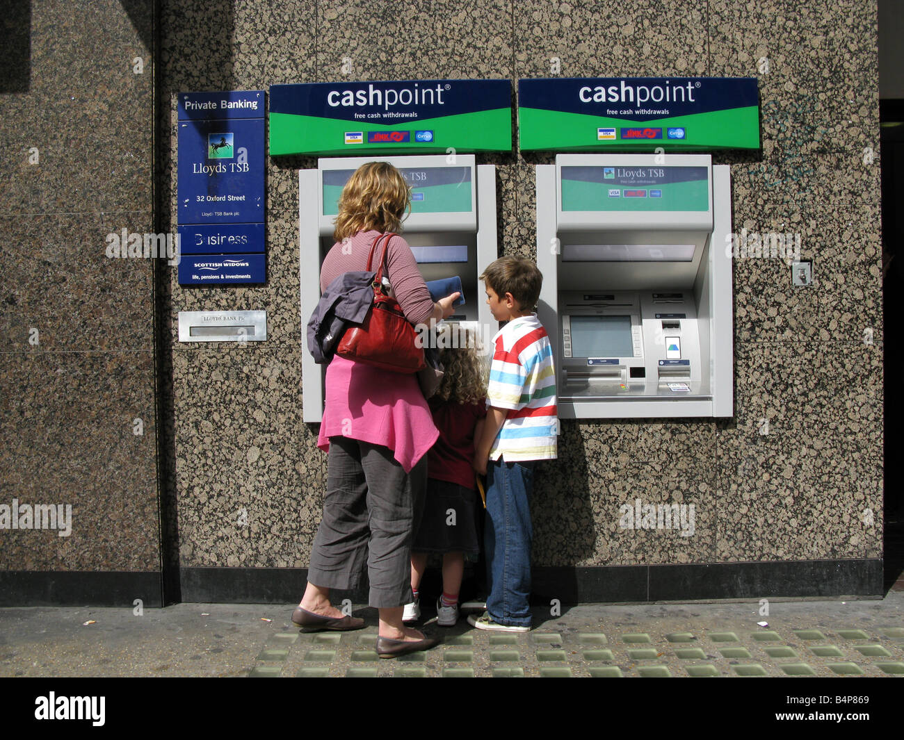 Mother atm machine hi-res stock photography and images - Alamy