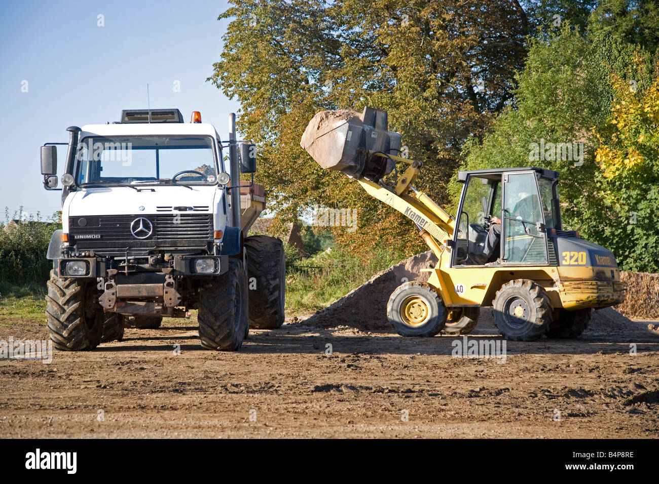 Spreading Lime On Agricultural Land Stock Photo - Alamy