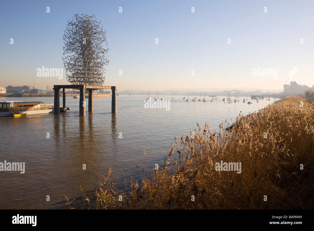 Iron metal modern statue sculpture structure on the Thames at the O2 ...