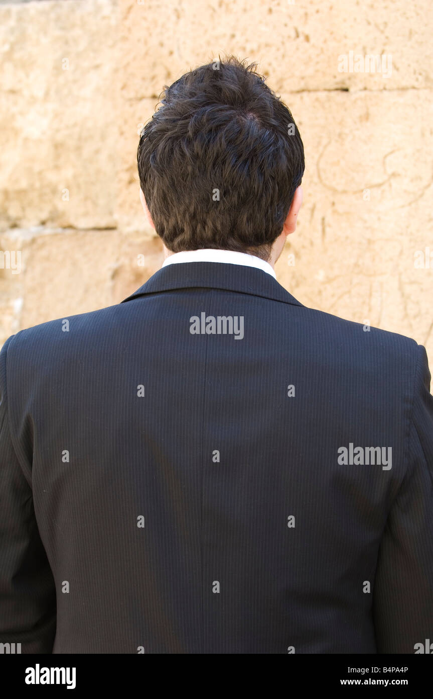 Rear view of a business man outdoors Stock Photo - Alamy