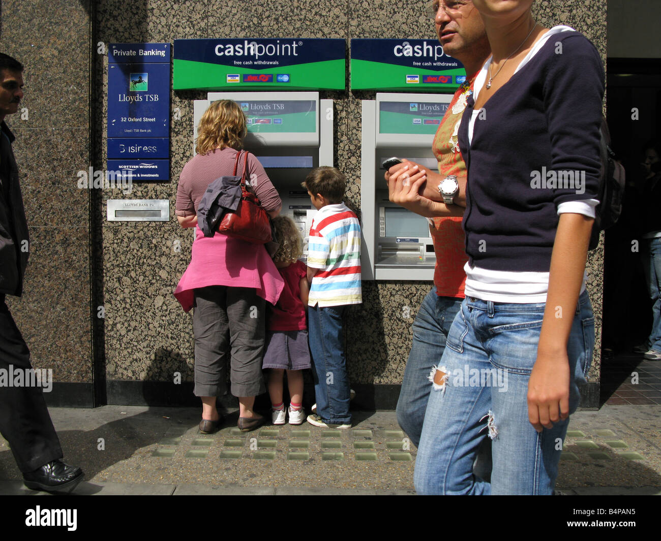 Mother atm machine hi-res stock photography and images - Alamy