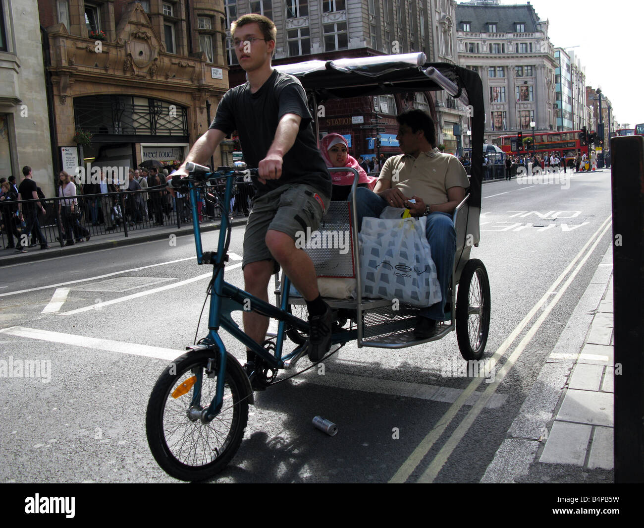 Rickshaw pedicab london hi-res stock photography and images - Alamy