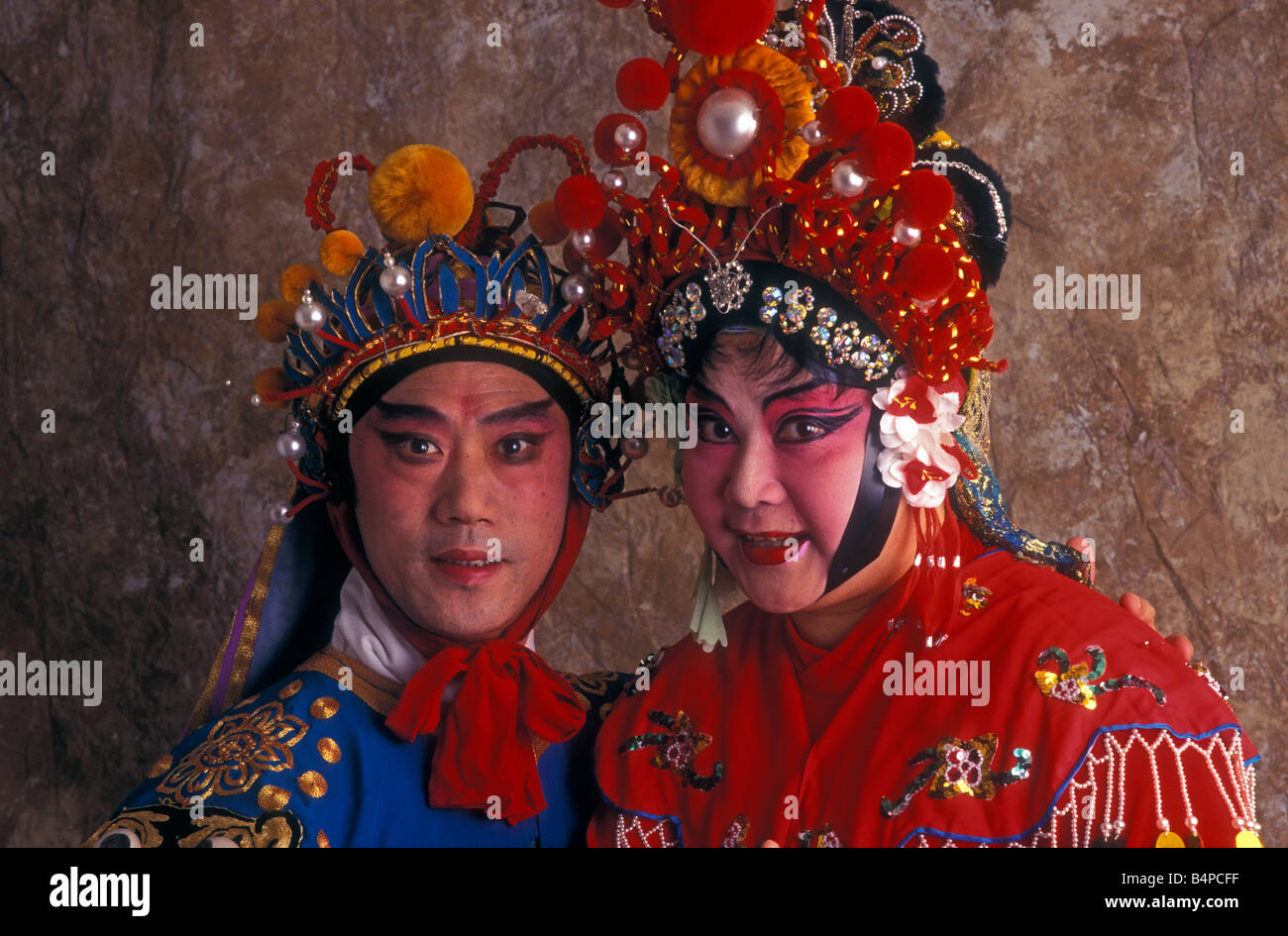 two asian opera performers traditional clothing headdress stage make up ...