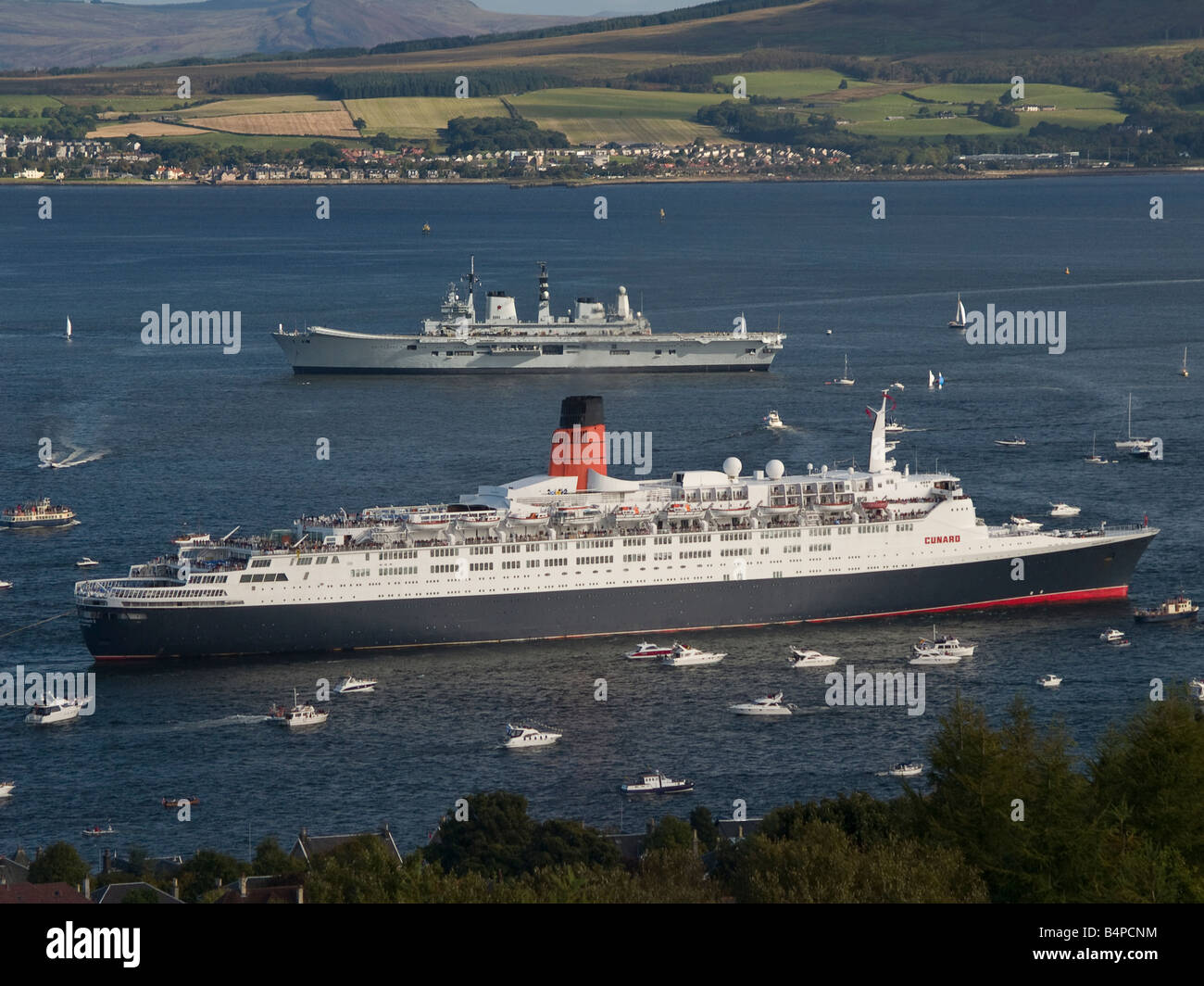 The QE2 and HMS Ark Royal off Greenock Stock Photo - Alamy