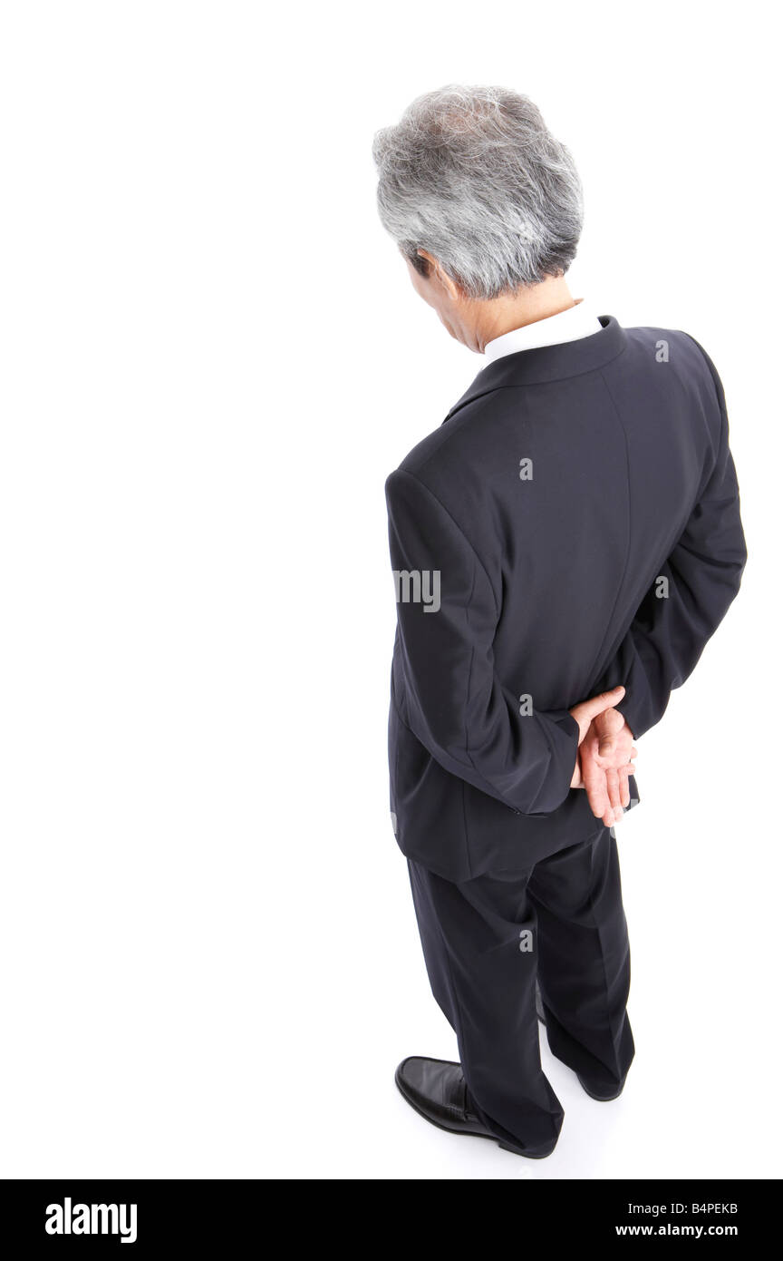 Man back view standing interior Cut Out Stock Images & Pictures - Alamy