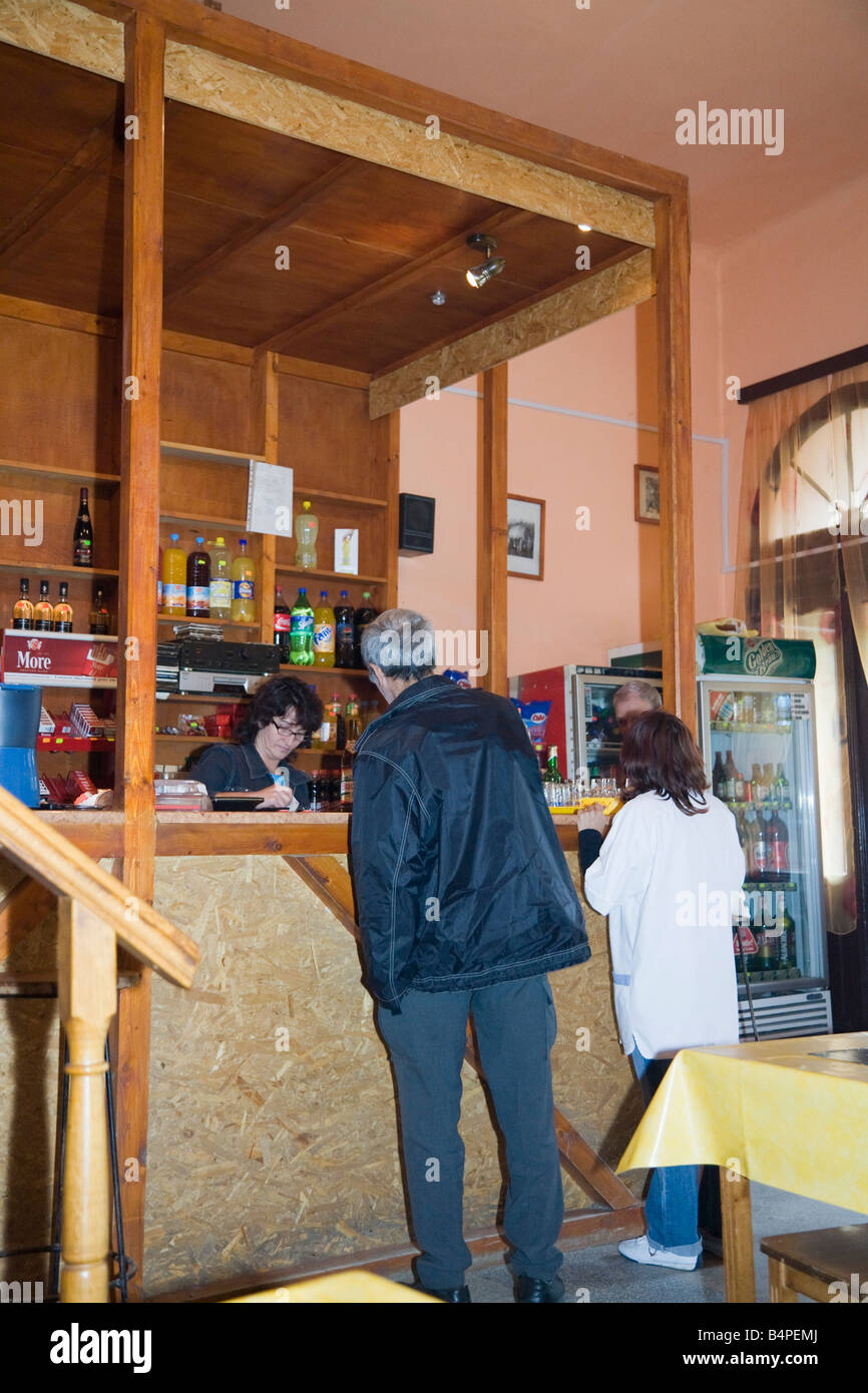 Biertan Transylvania Romania Europe Two people standing at a bar inside ...