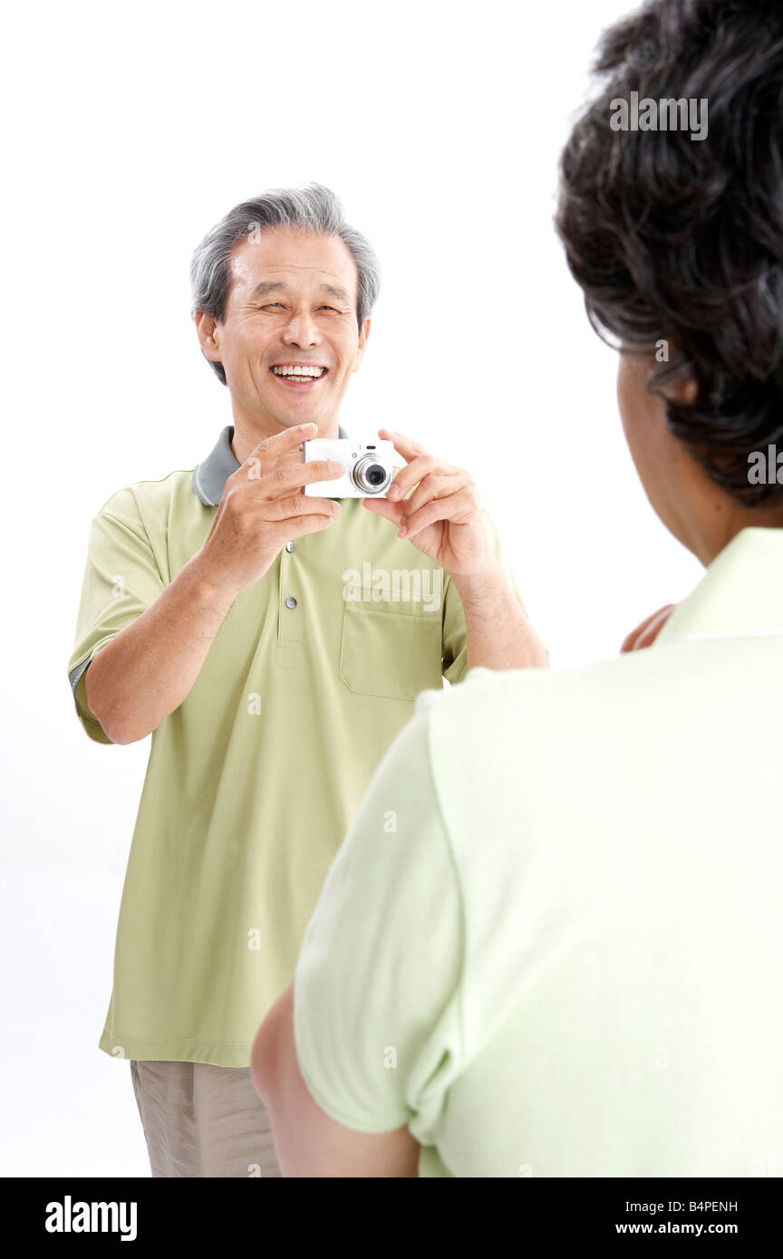 Cropped man photographing woman hi-res stock photography and images - Alamy