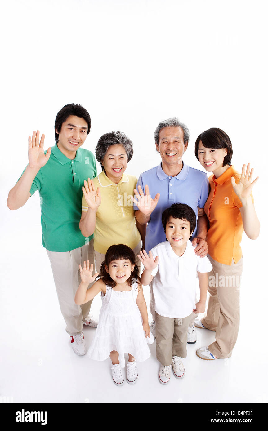 Multi generation family smiling waving hi-res stock photography and ...