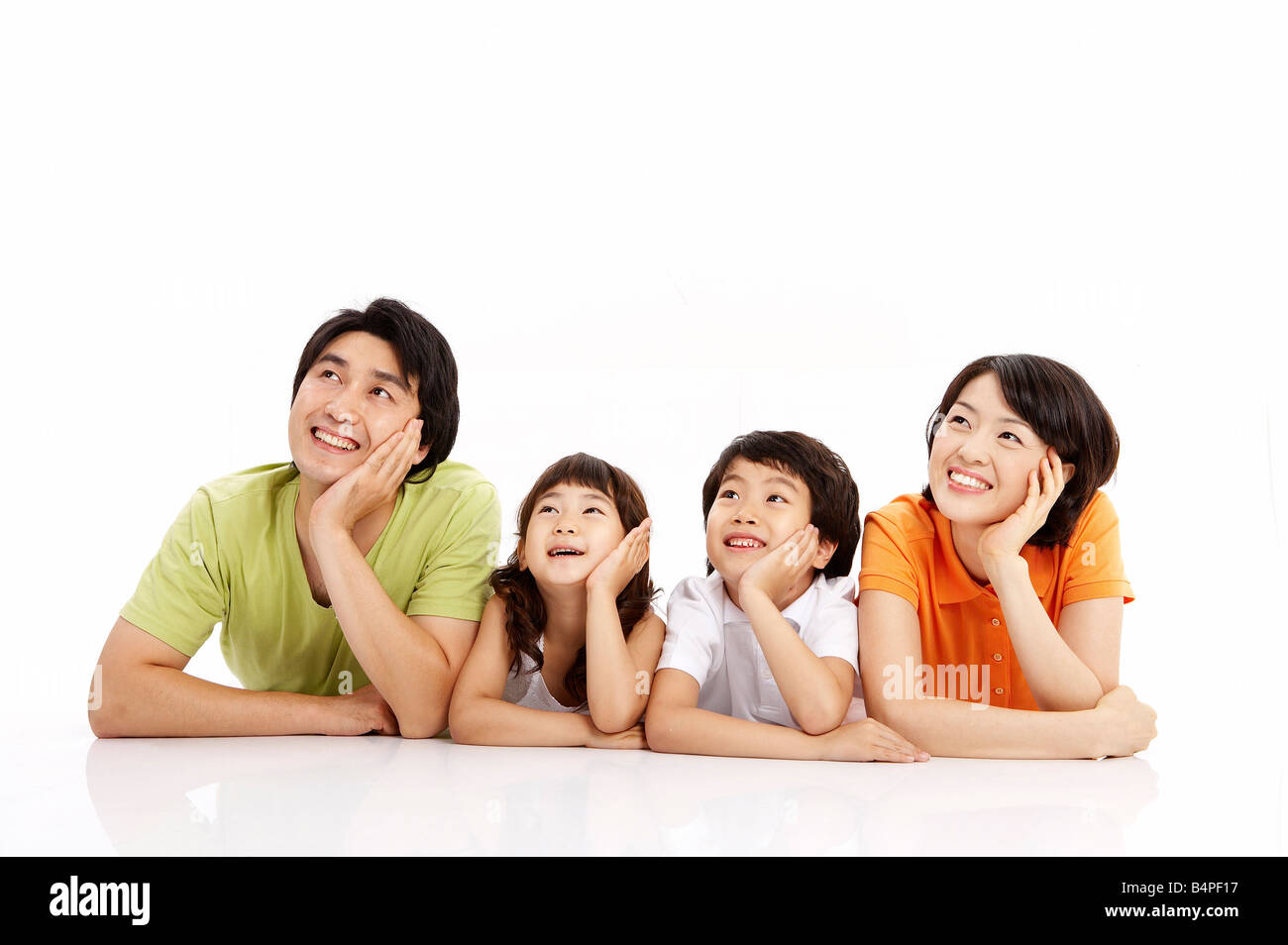 Portrait of family with hand on chin Stock Photo - Alamy