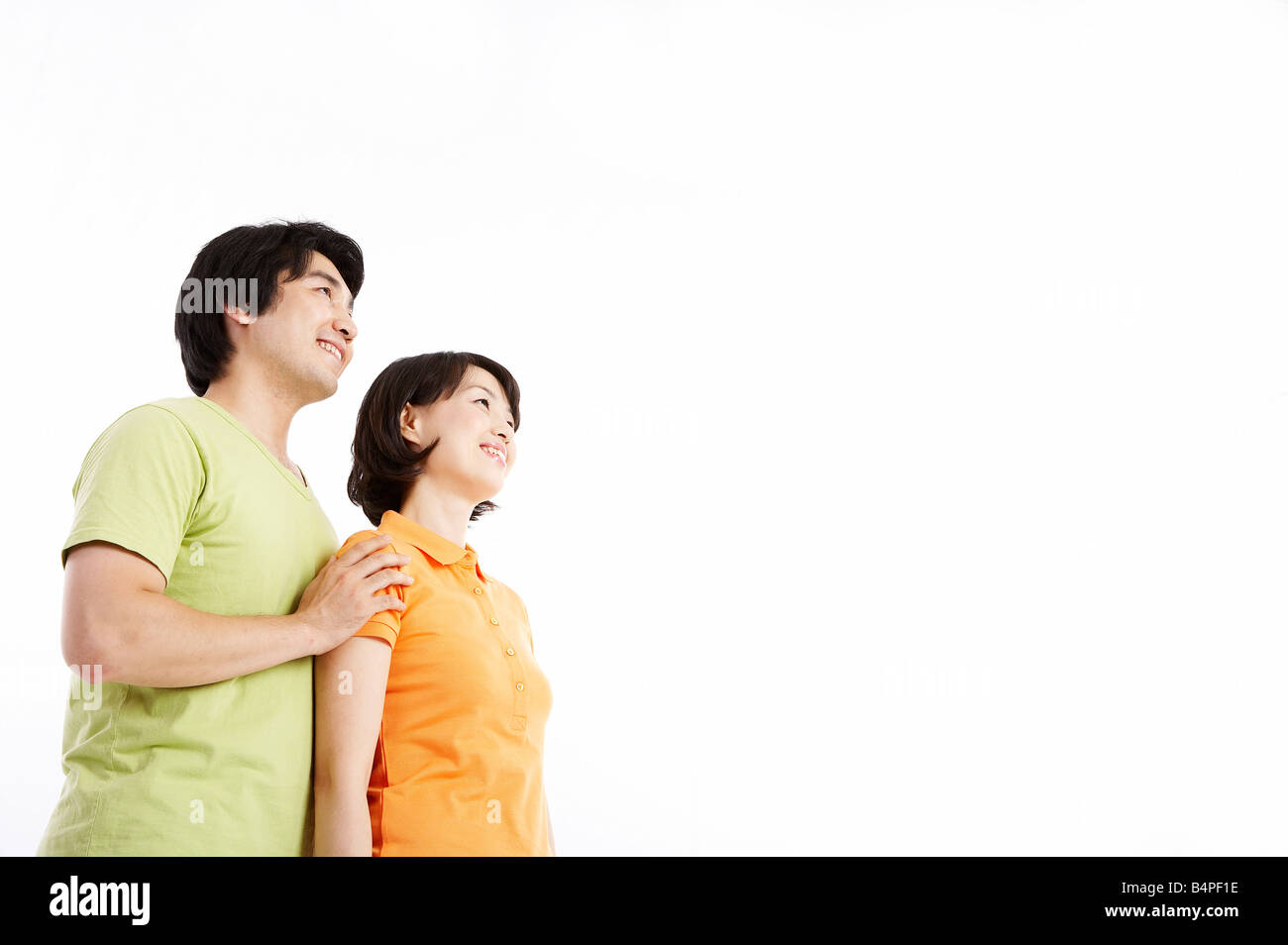 Mid adult couple smiling Stock Photo - Alamy