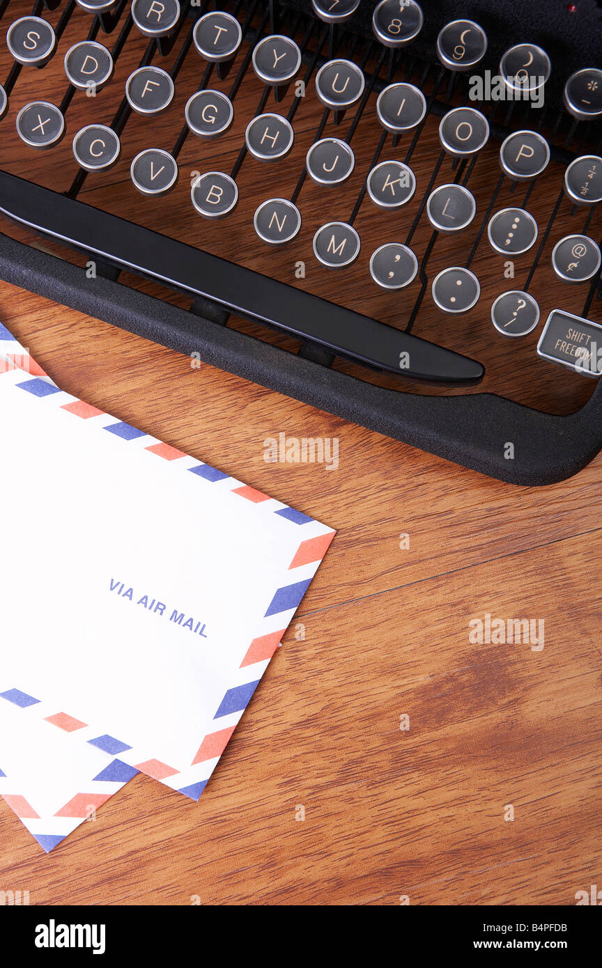 Typewriter with air mail envelops, close up Stock Photo - Alamy