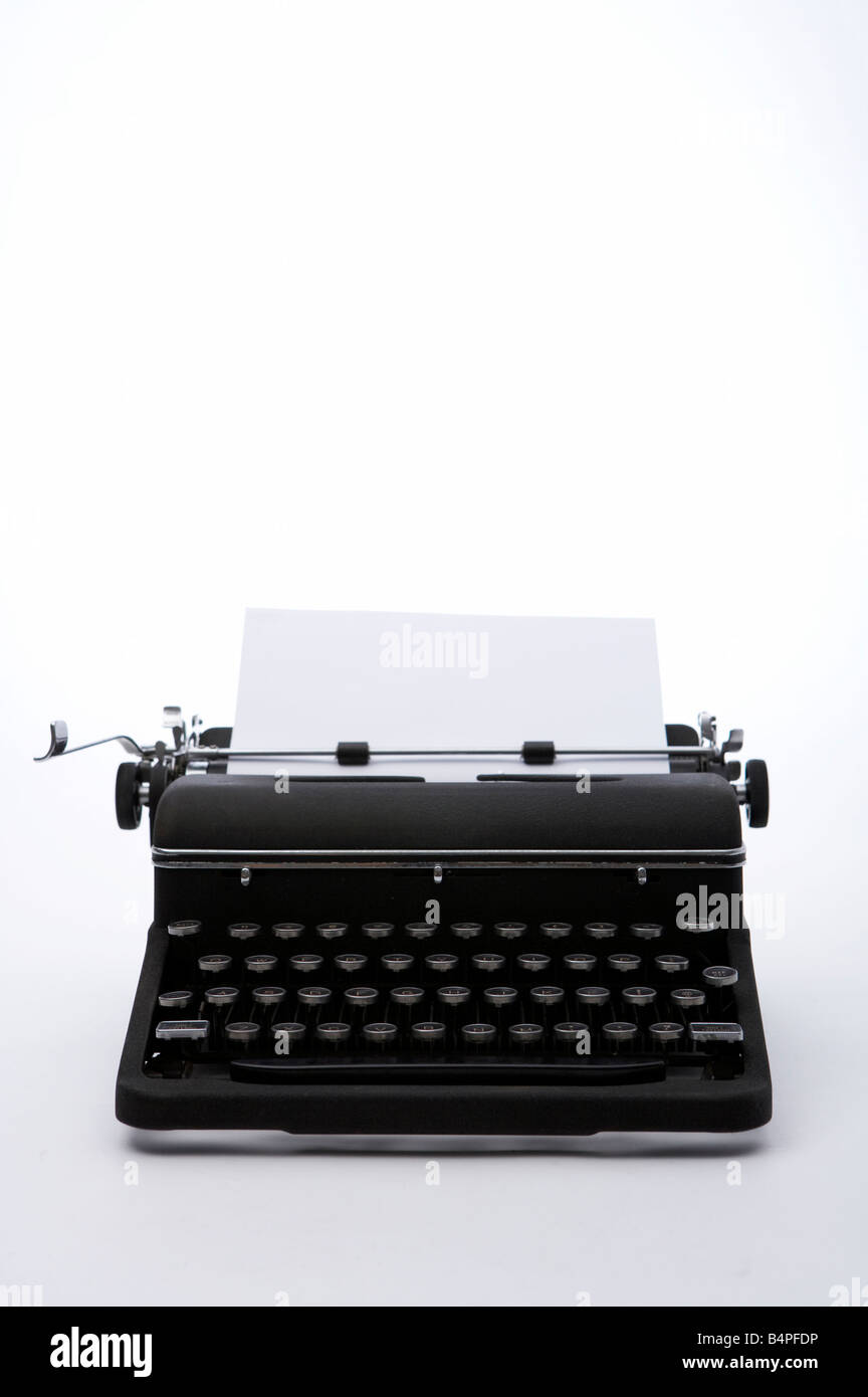 Typewriter attached with paper, close up Stock Photo - Alamy