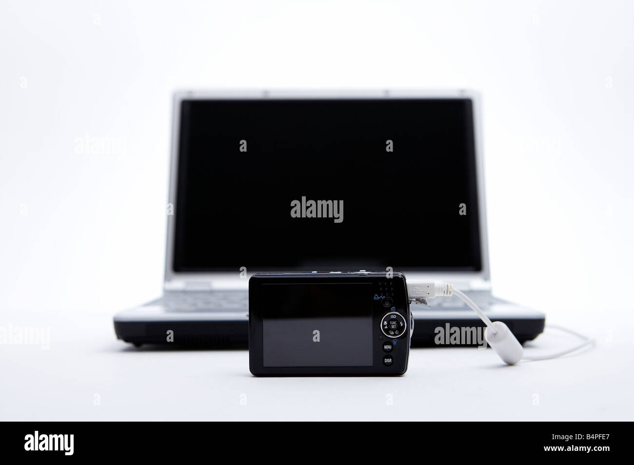Camera connected to laptop with cable hi-res stock photography and ...
