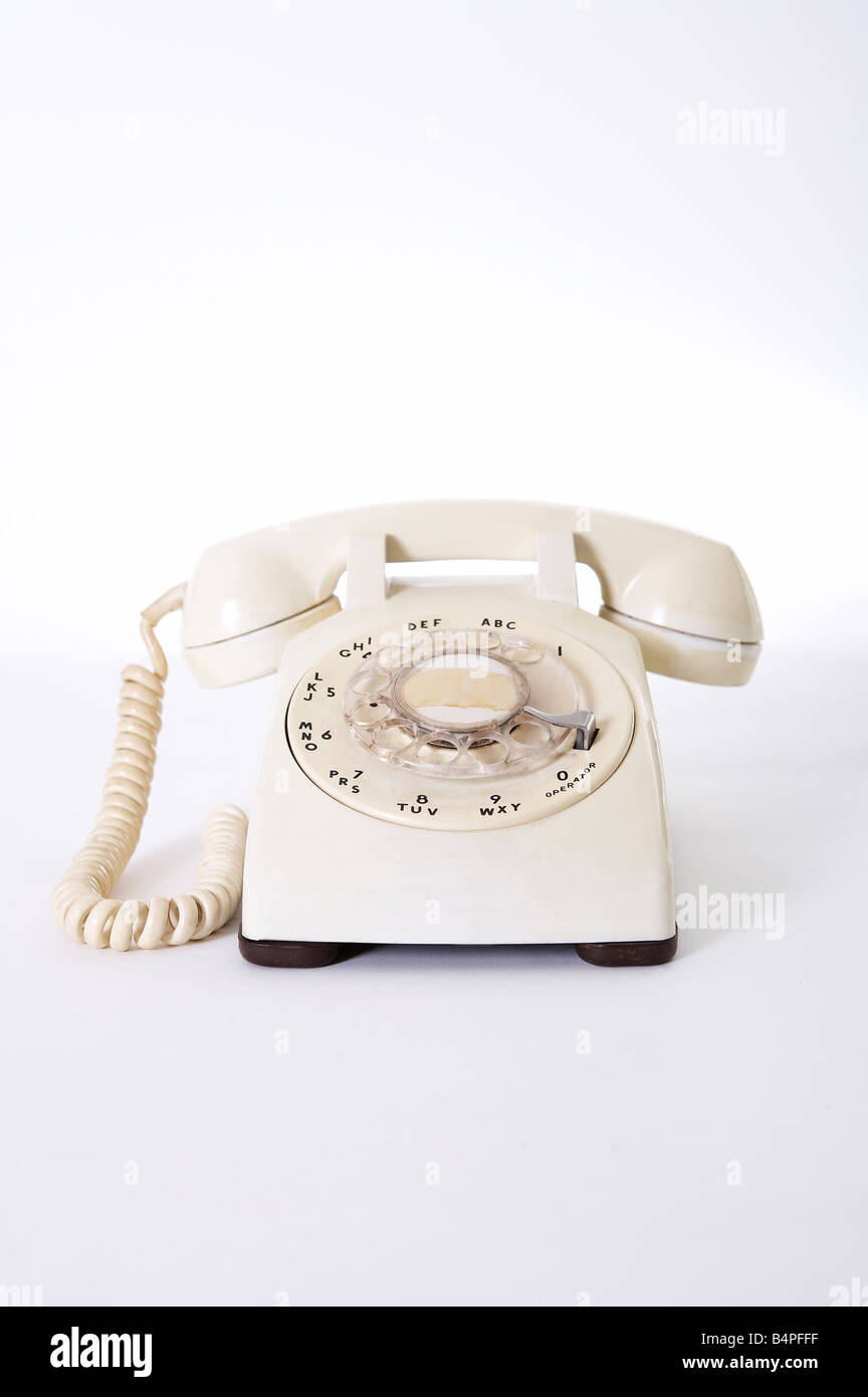 White rotary telephone on white background, close-up Stock Photo - Alamy
