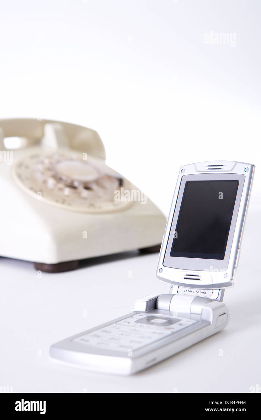 Mobile phone with rotary telephone, close-up Stock Photo - Alamy