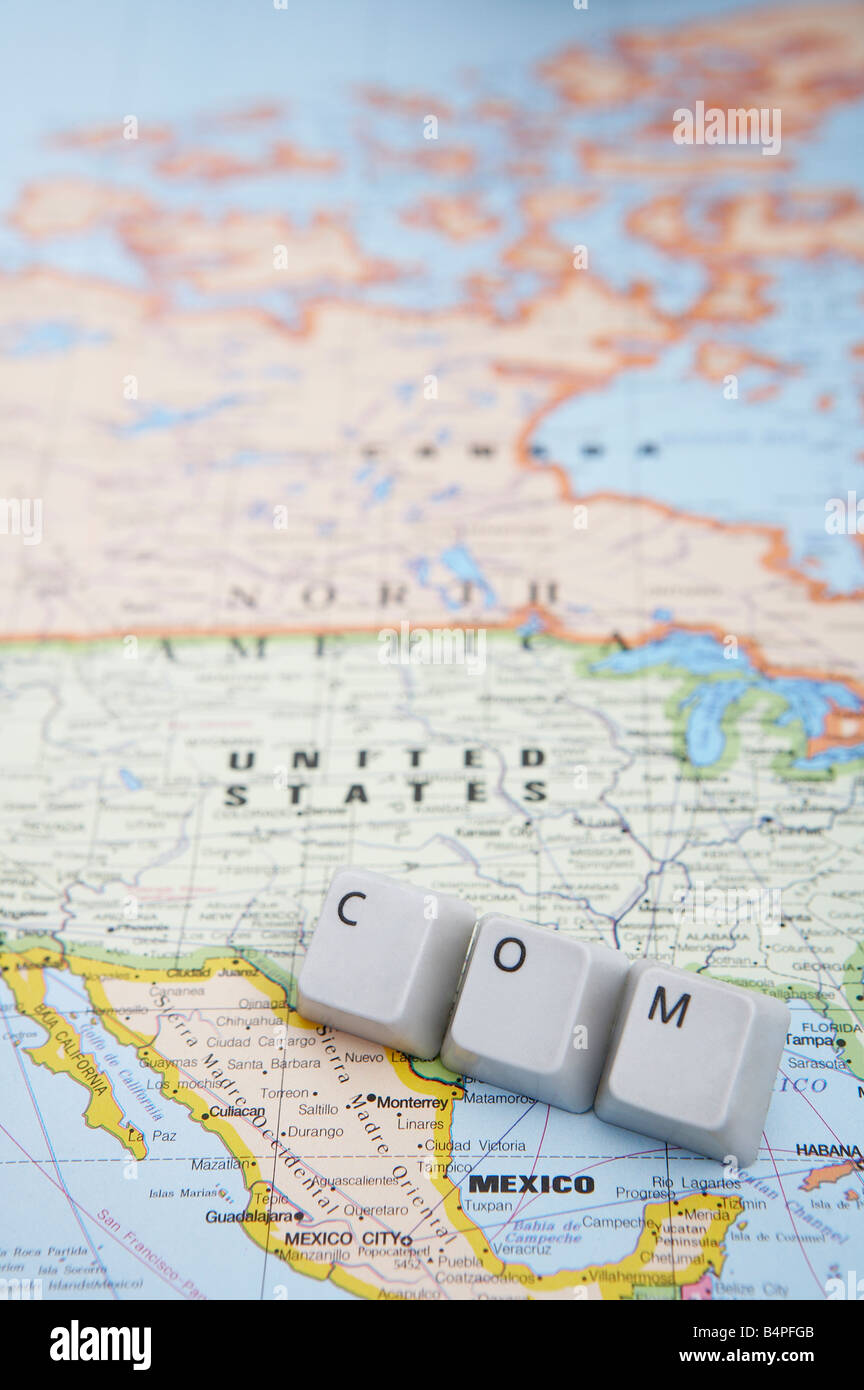 Computer keys on world map Stock Photo - Alamy