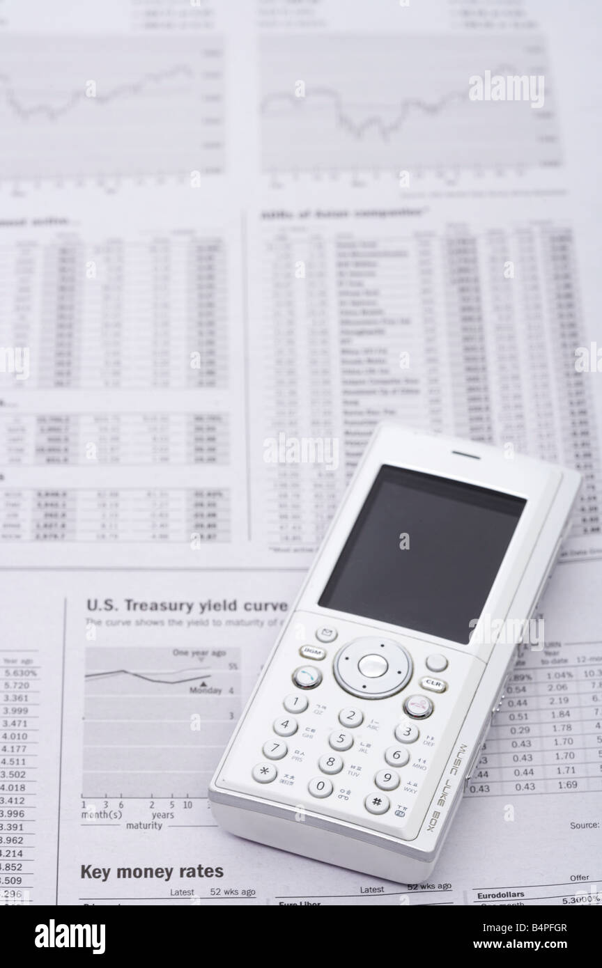 Mobile phone on a sheet of paper Stock Photo - Alamy