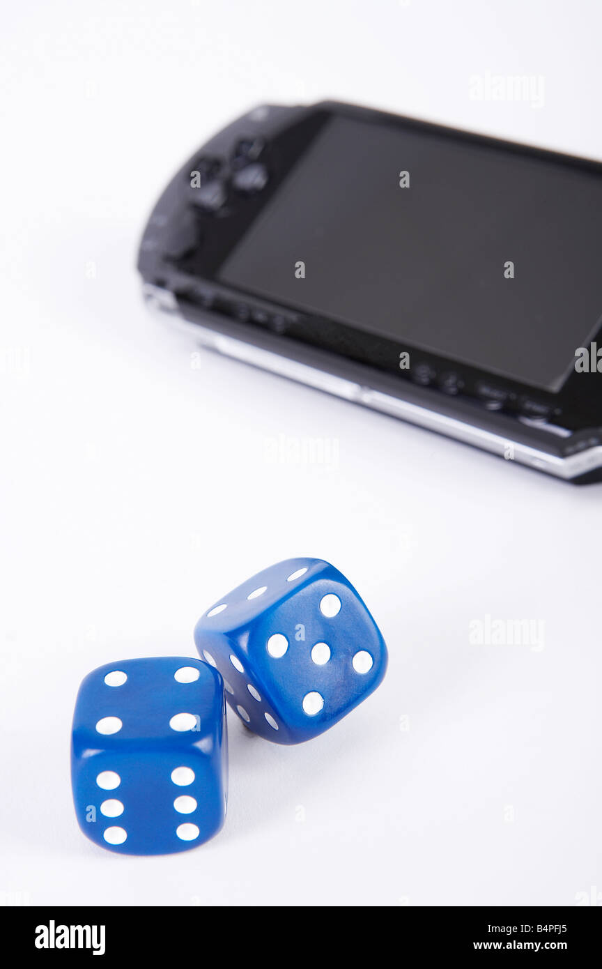 Mobile phone and dices against white background Stock Photo - Alamy