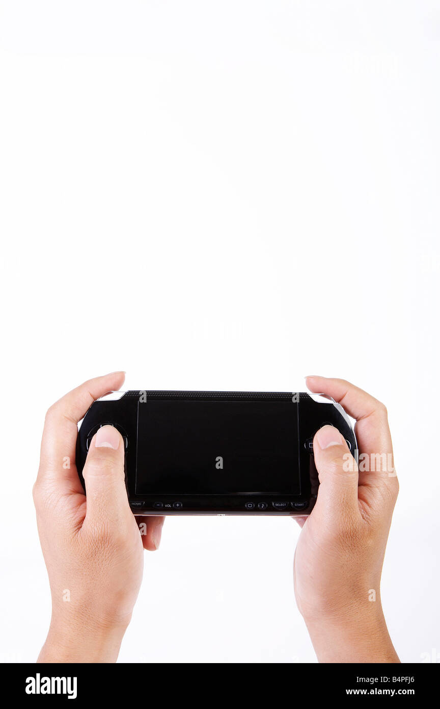 Man playing playstation portable, close up Stock Photo - Alamy