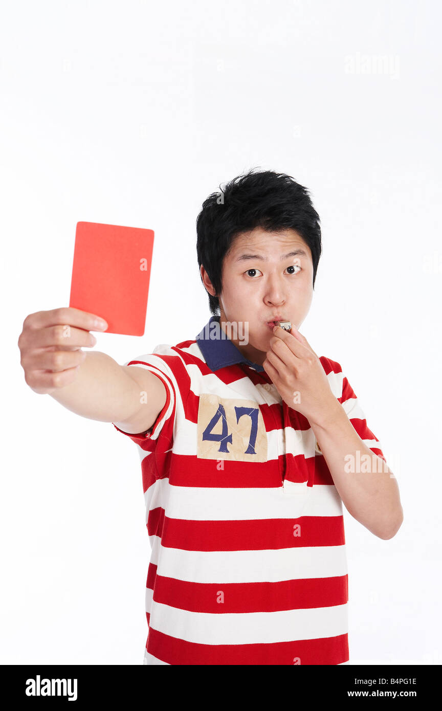 Whistle blow red card hi-res stock photography and images - Alamy