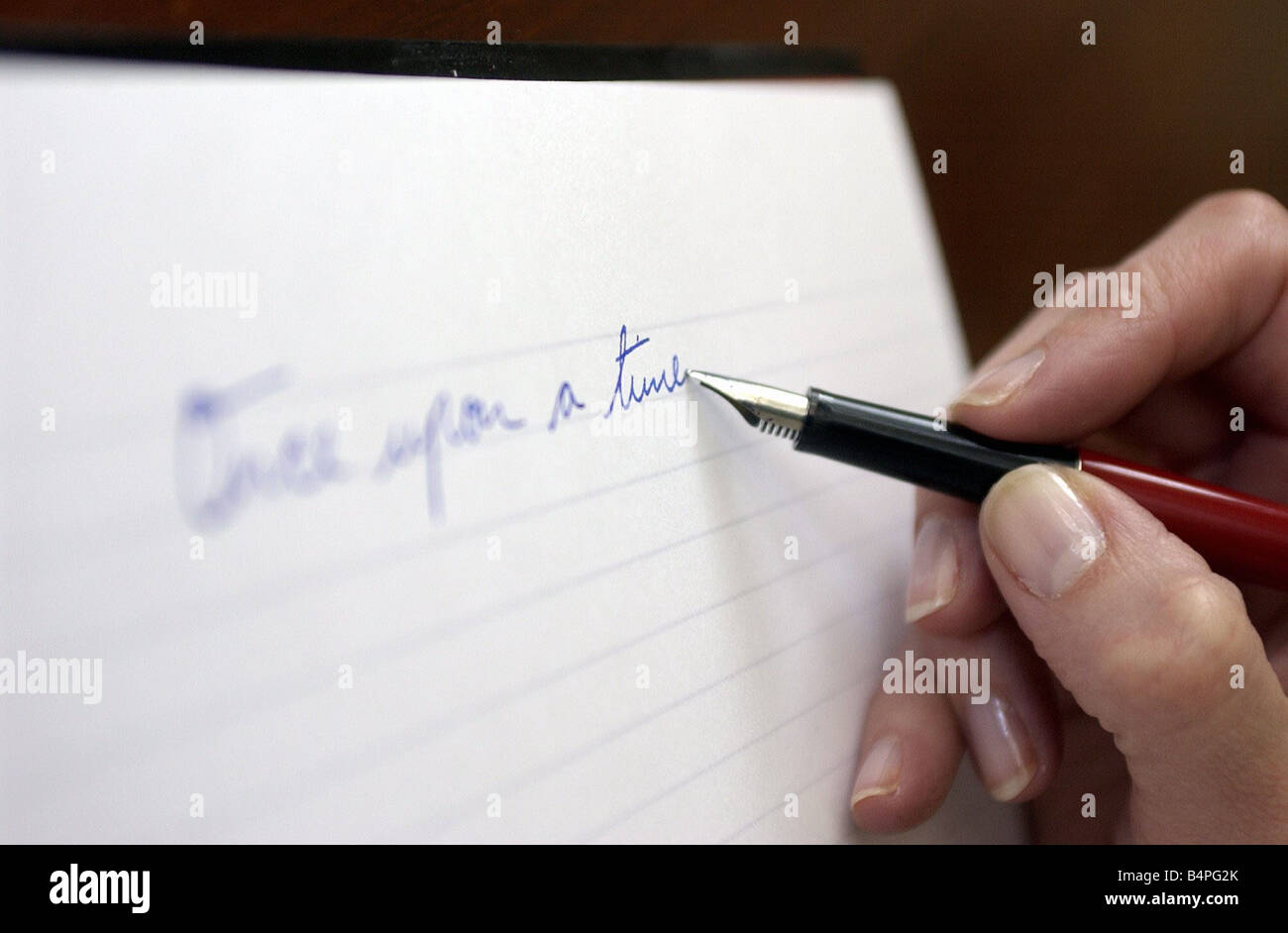 Person writing a letter on paper hi-res stock photography and images ...