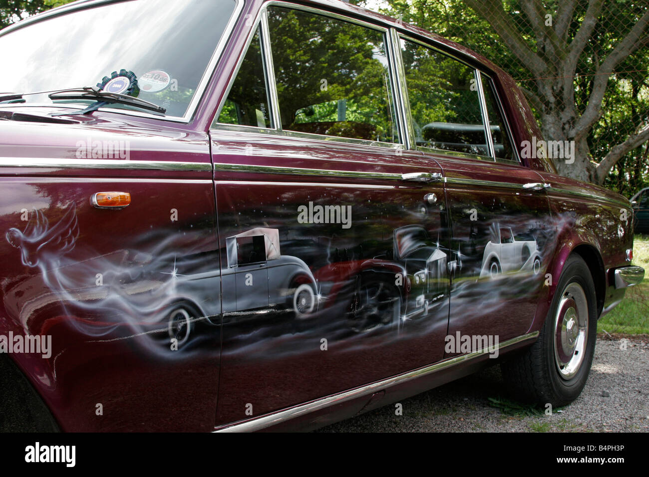 Customized Rolls Royce with spray painted images Stock Photo - Alamy
