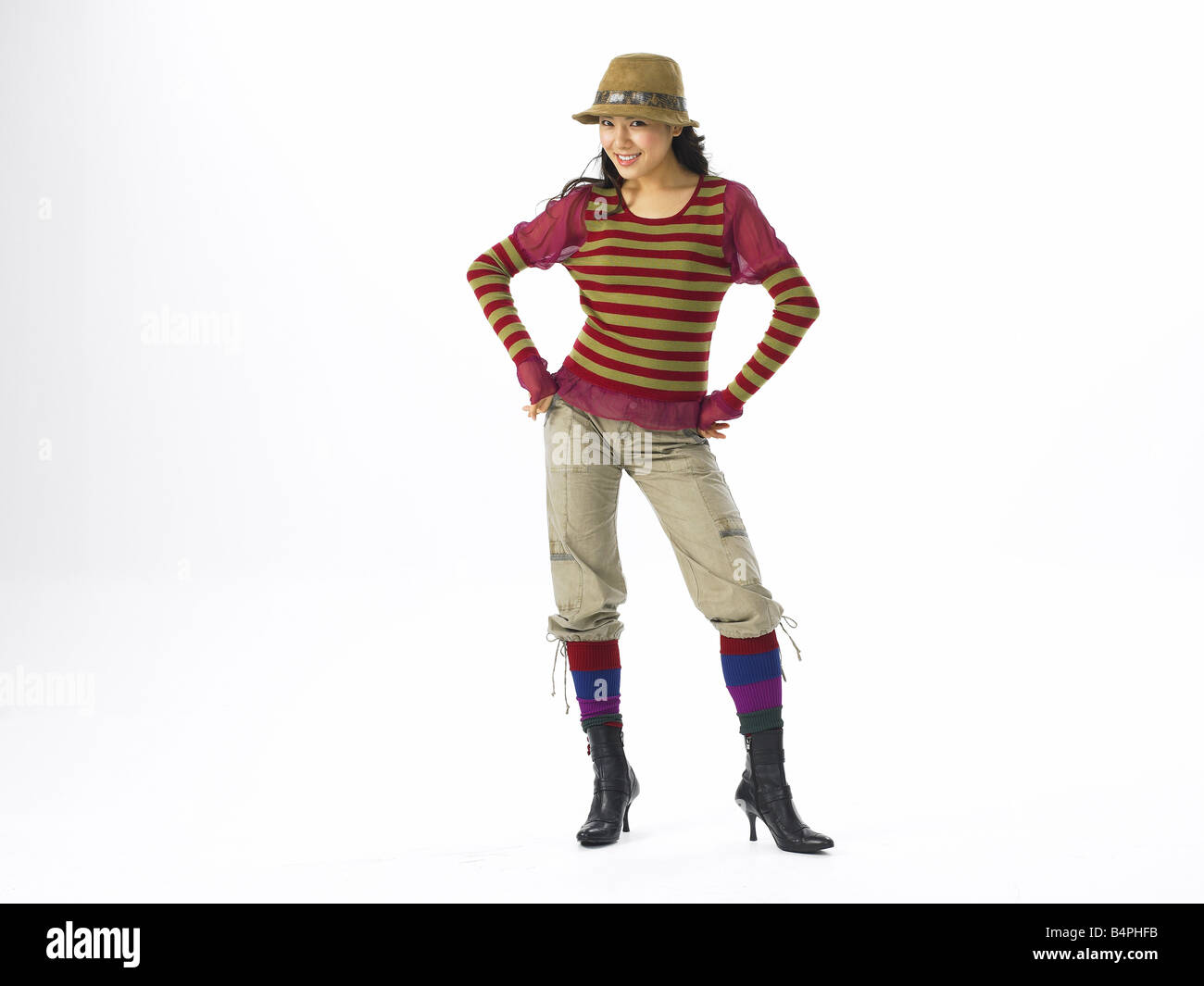 Hand on hips legs apart hi-res stock photography and images - Alamy