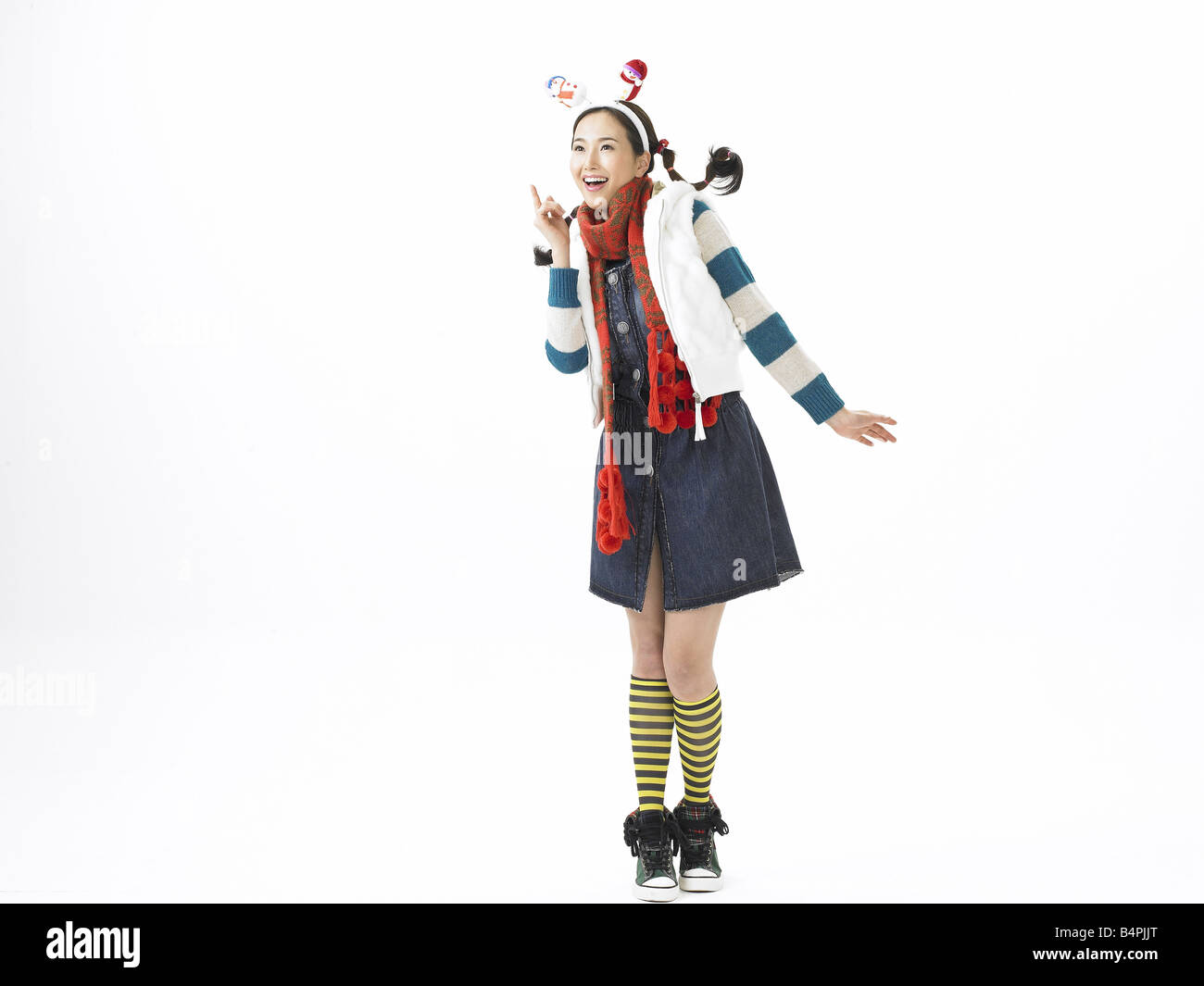 Young woman dancing, smiling Stock Photo - Alamy