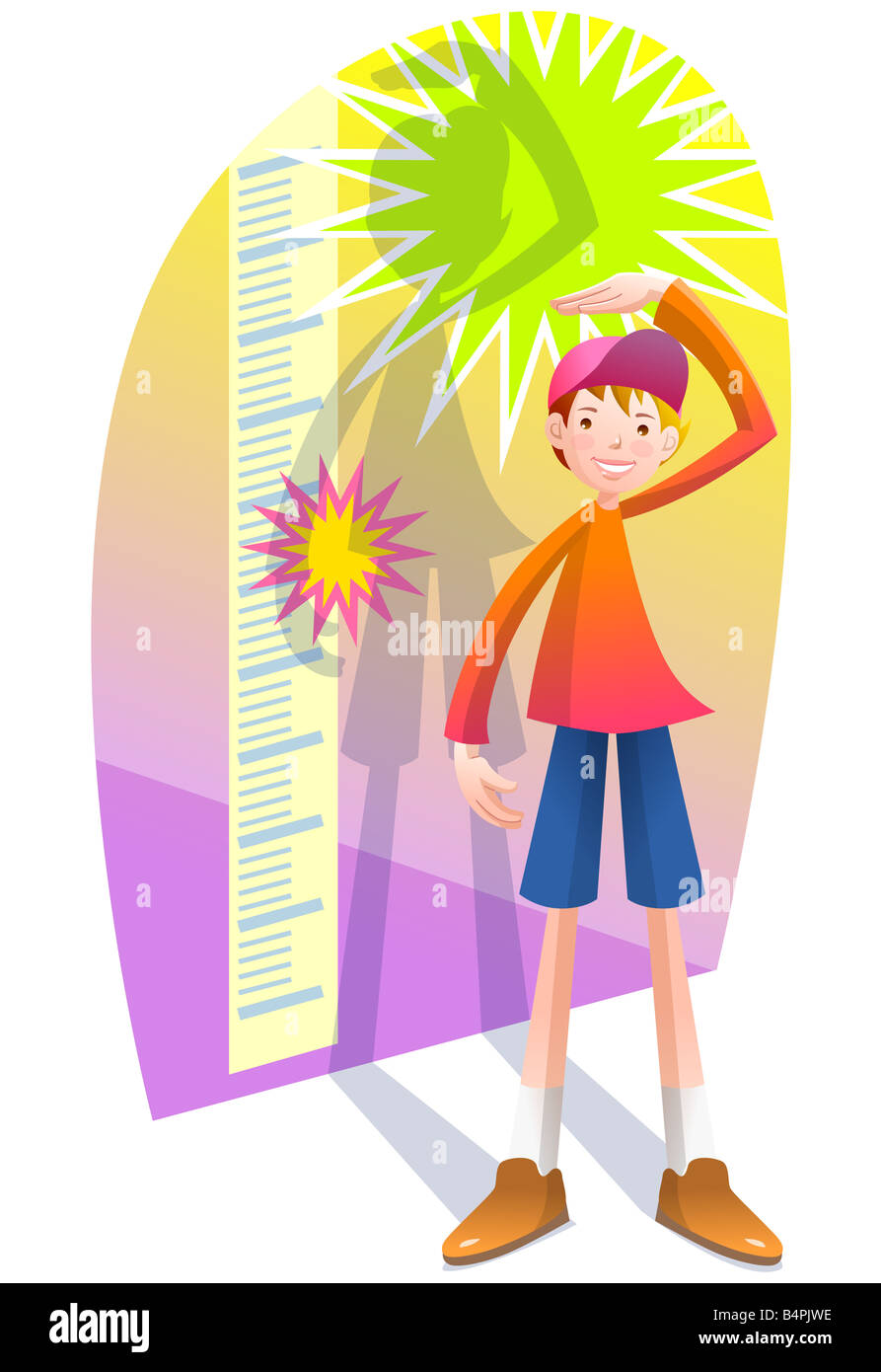 Boy measuring against height chart Stock Photo - Alamy