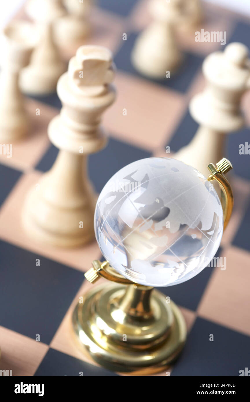 Chessboard with globe Stock Photo - Alamy