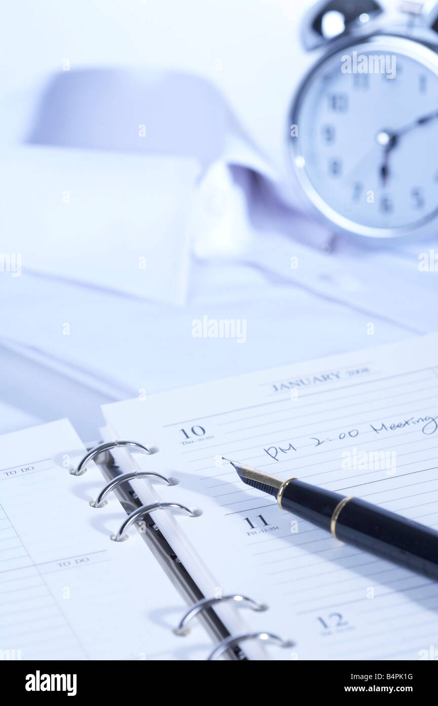 Clock inside open book hi-res stock photography and images - Alamy