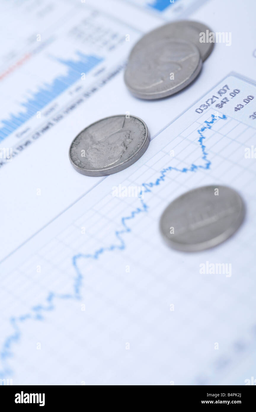 Coins and financial paper Stock Photo - Alamy