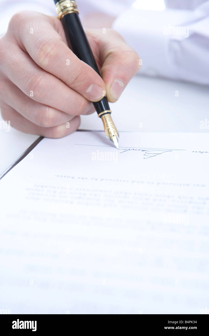 Human hand signing authority document hi-res stock photography and ...