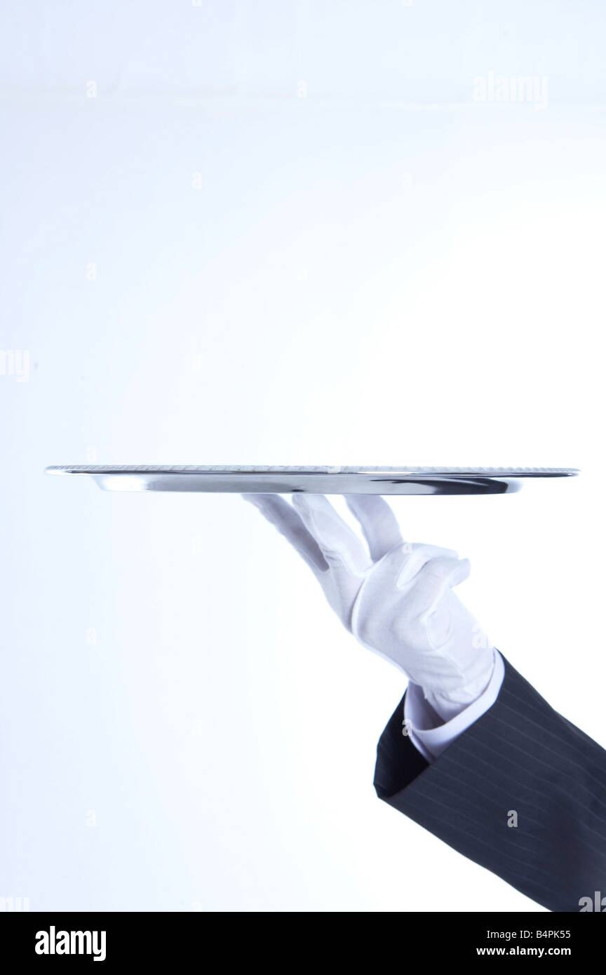Person holding serving tray, close up Stock Photo - Alamy