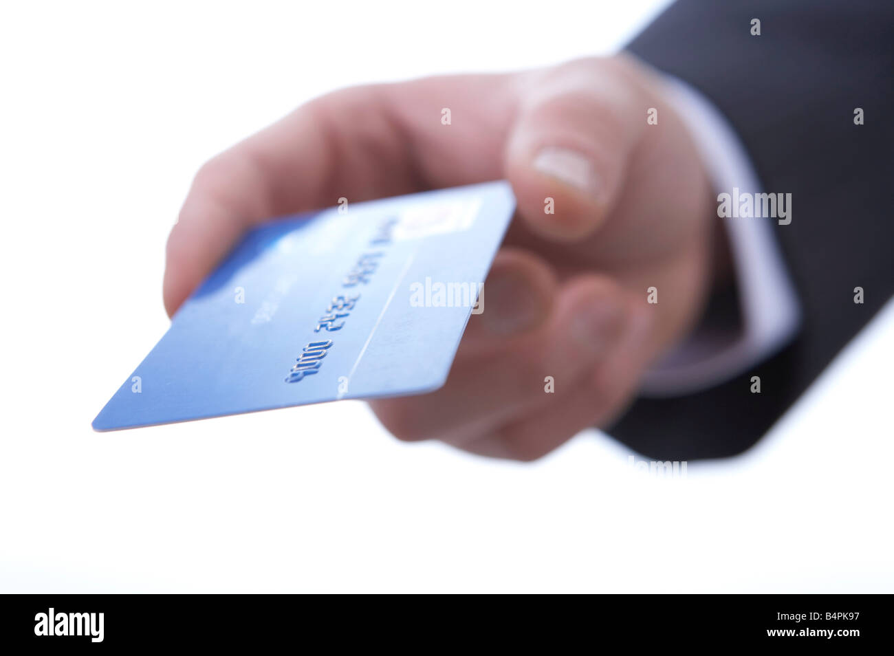 Businessman giving credit card, close up Stock Photo - Alamy