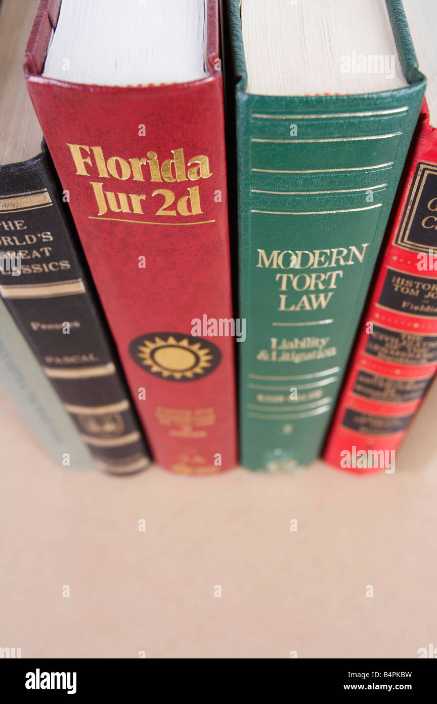 Row of books against white background Stock Photo - Alamy