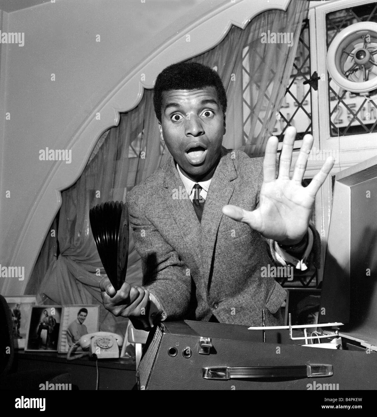 Singer and Comedian Kenny Lynch seen here with his latest record to ...
