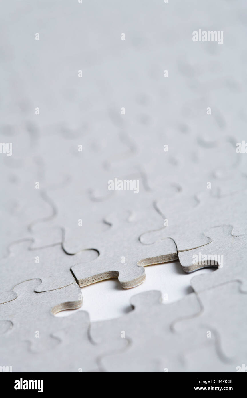 Blank jigsaw puzzle with one piece missing Stock Photo - Alamy