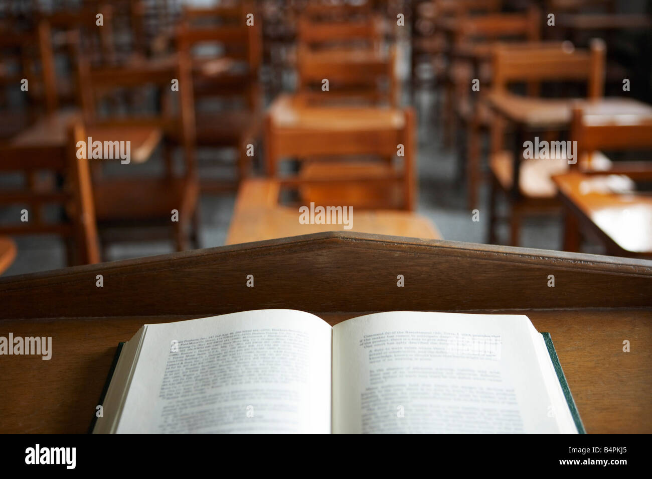 Open book on wooden bench, close-up Stock Photo - Alamy