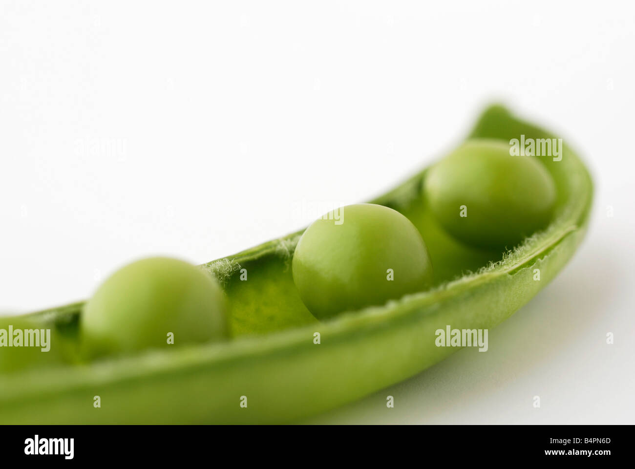 Peas in pod Stock Photo - Alamy