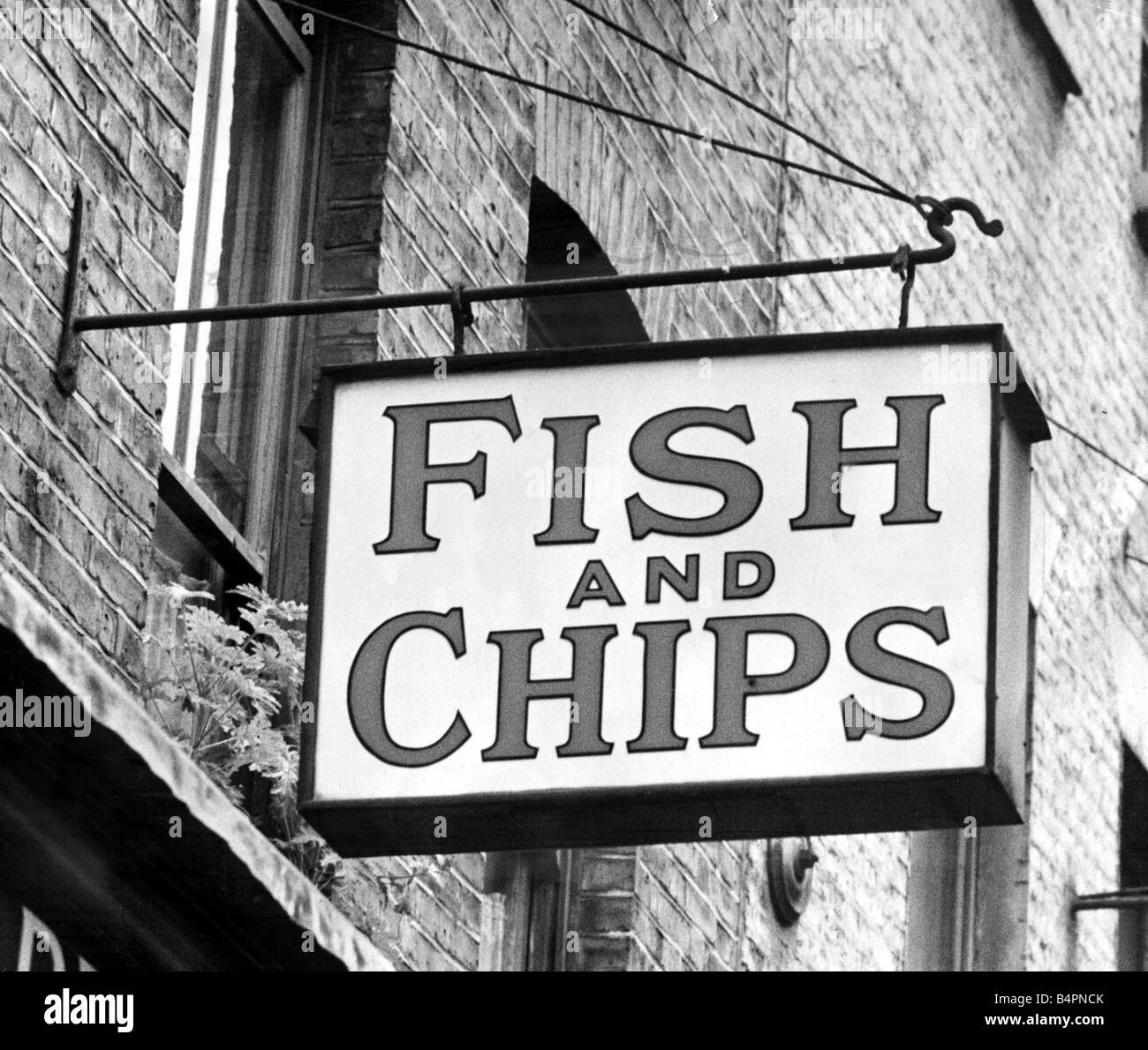 Fish and chip signpost Stock Photo - Alamy