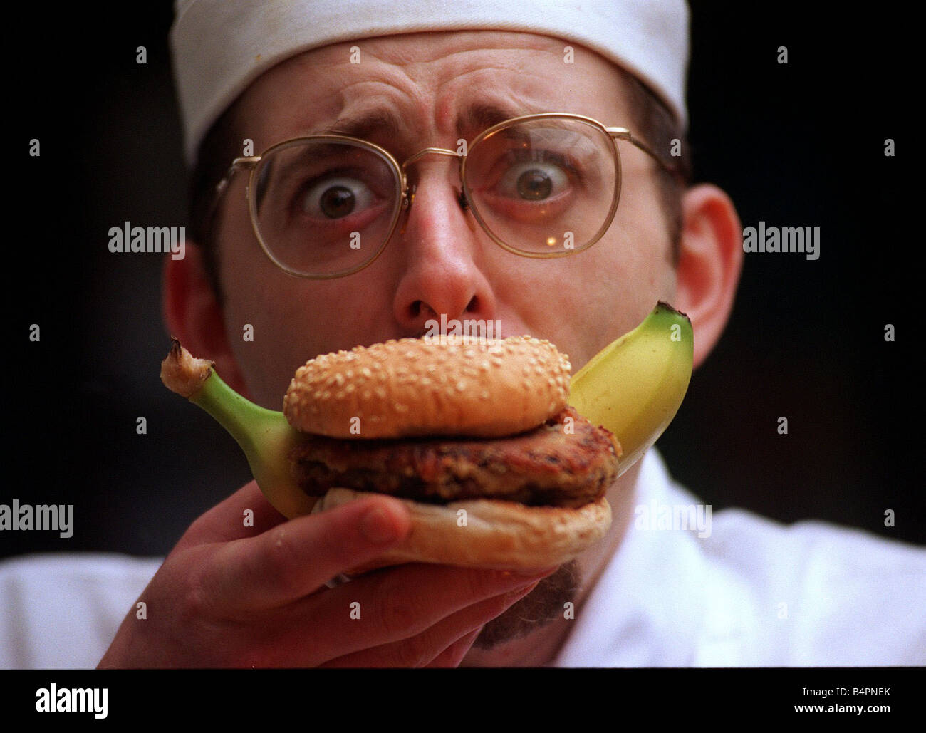 John Quigley chef eating a banana burger Stock Photo - Alamy