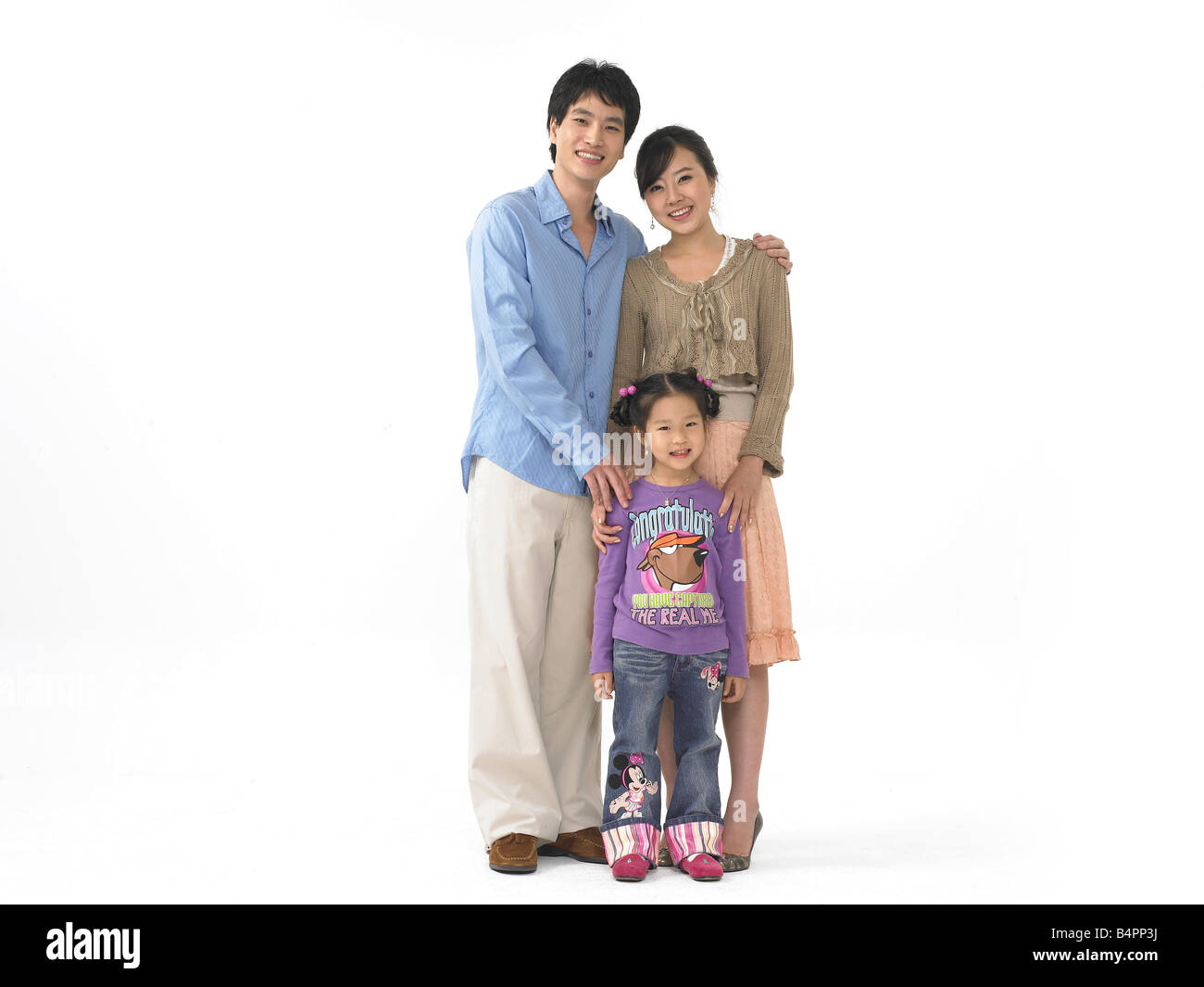 Parents with daughter against white background Stock Photo - Alamy