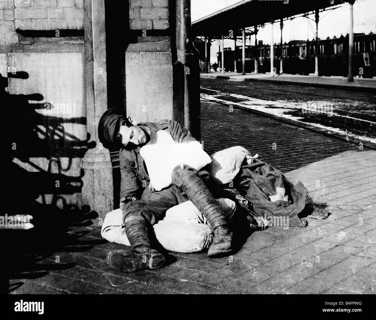 Wounded British soldier waiting for the Red Cross and a train home to ...